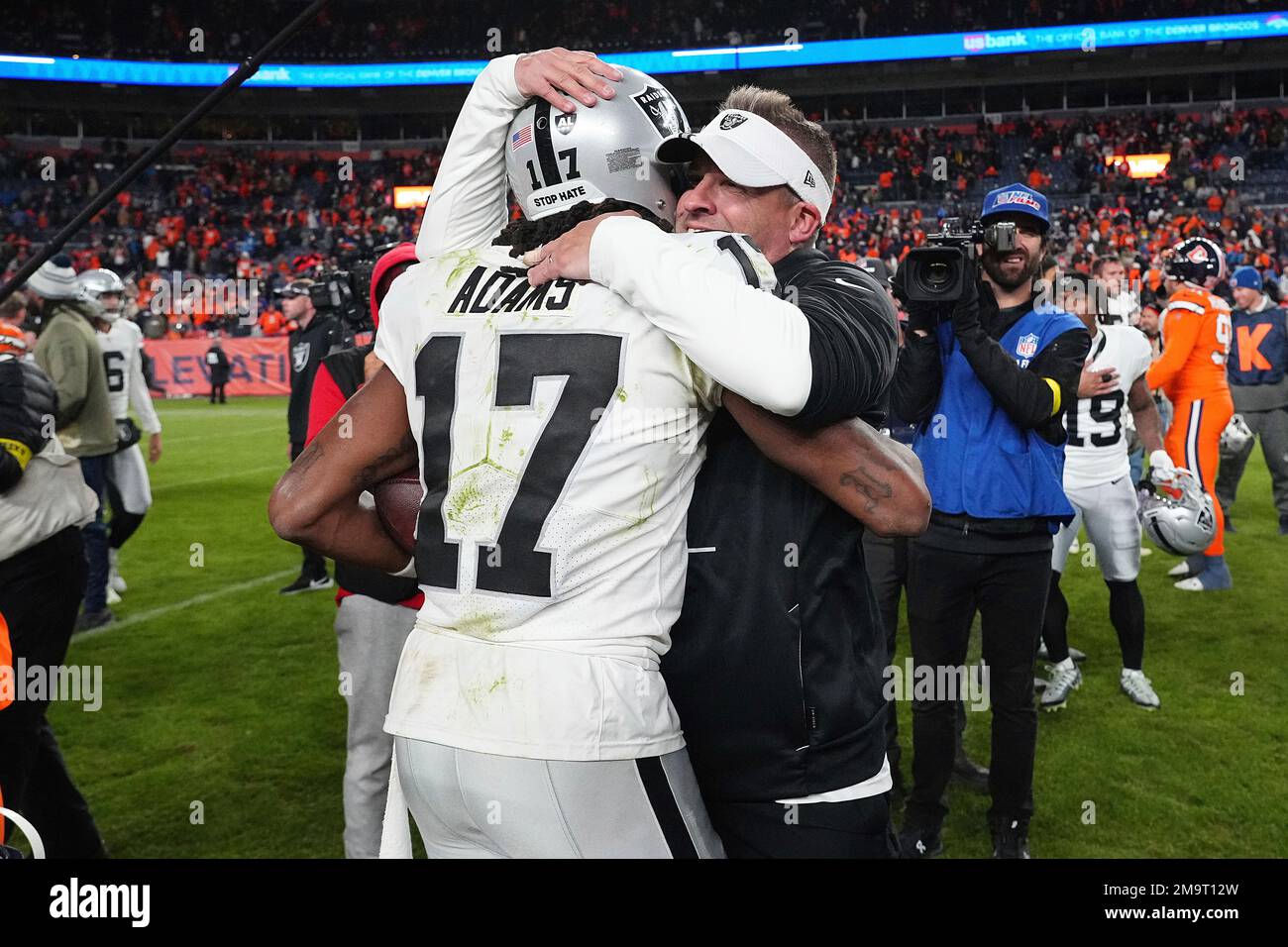 Las Vegas Raiders wide receiver Davante Adams (17) and head coach Josh ...