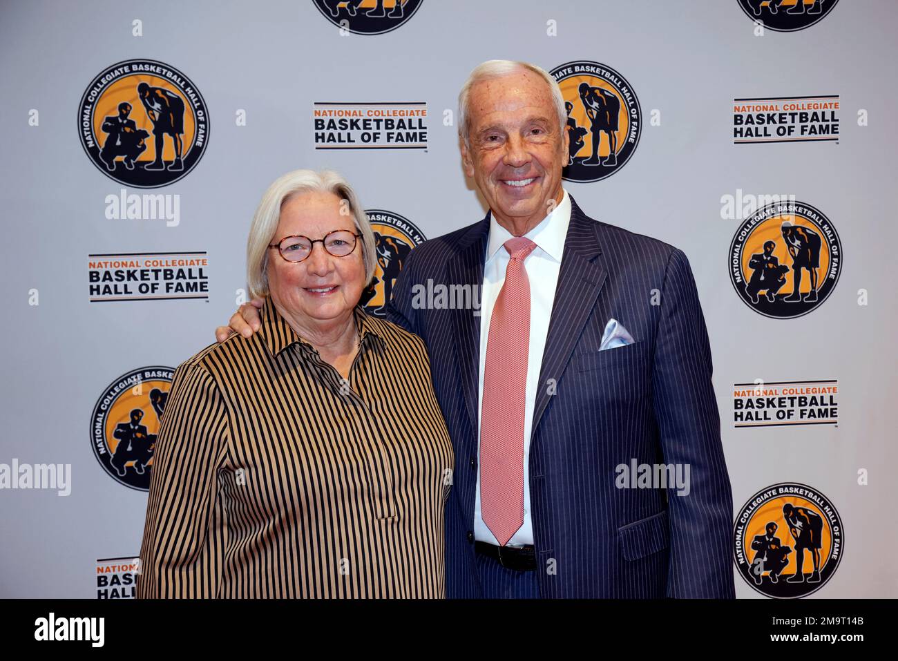 Roy Williams, former head coach for North Carolina and Kansas, right ...