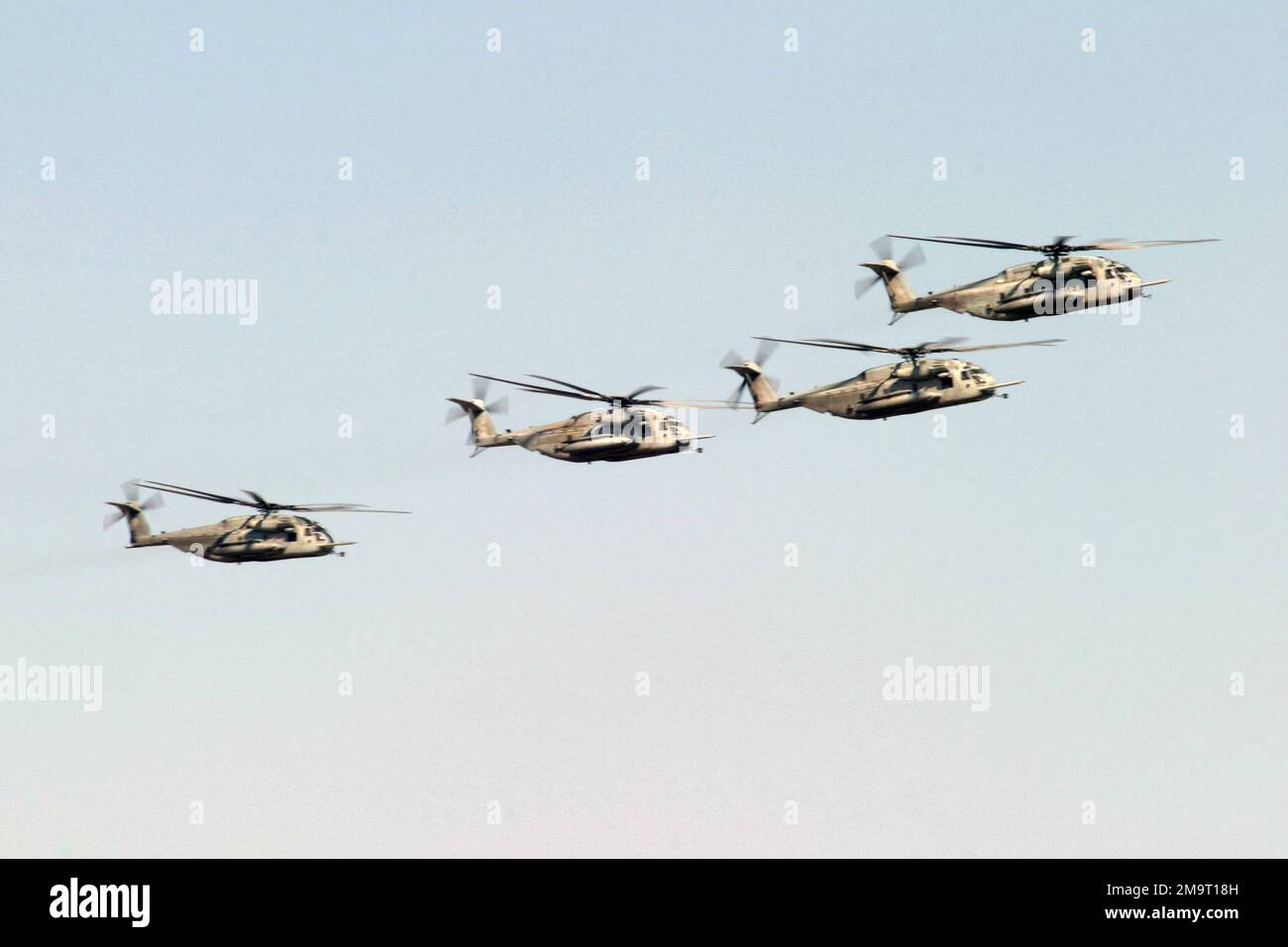 Four US Marine Corps (USMC) CH-53E Sea Stallion helicopter assigned to ...