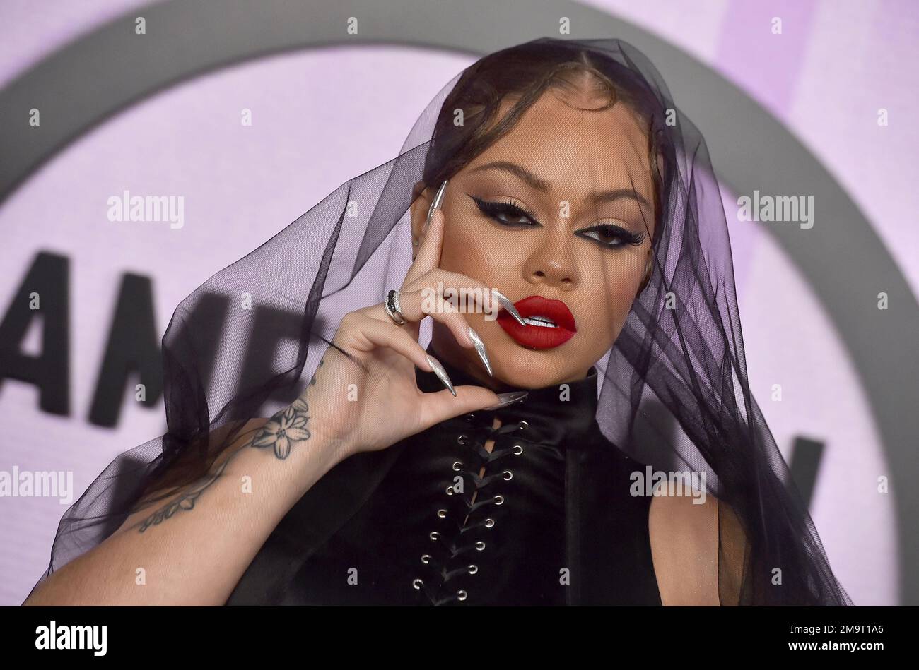 Latto arrives at the American Music Awards on Sunday, Nov. 20, 2022, at ...