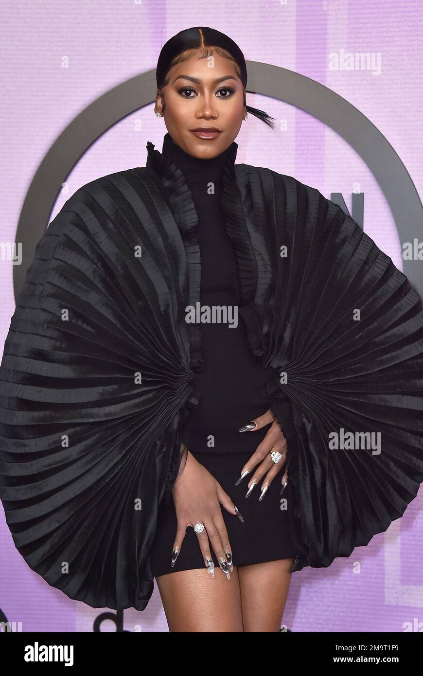 Muni Long arrives at the American Music Awards on Sunday, Nov. 20, 2022 ...