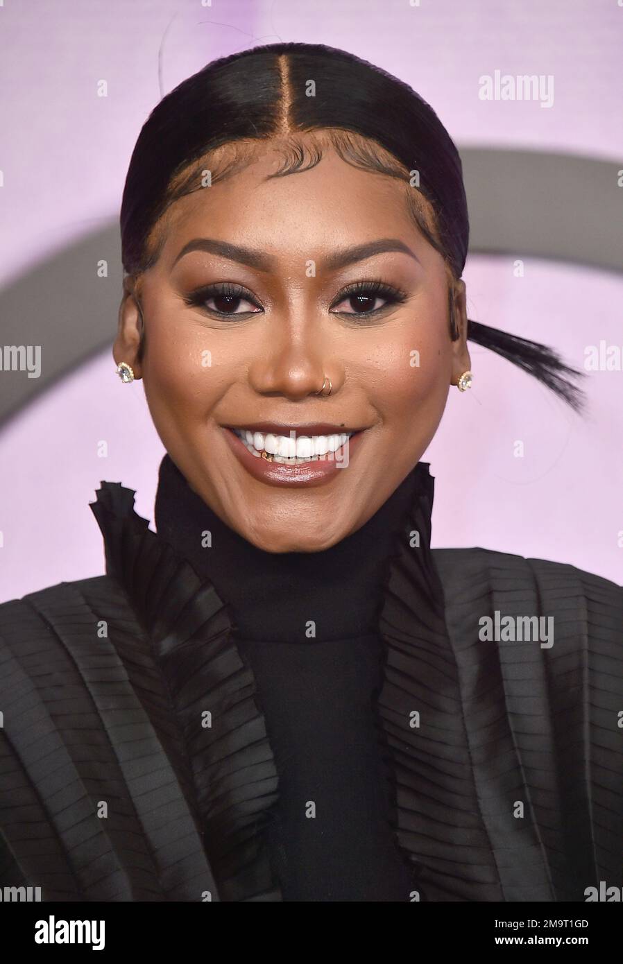 Muni Long arrives at the American Music Awards on Sunday, Nov. 20, 2022 ...