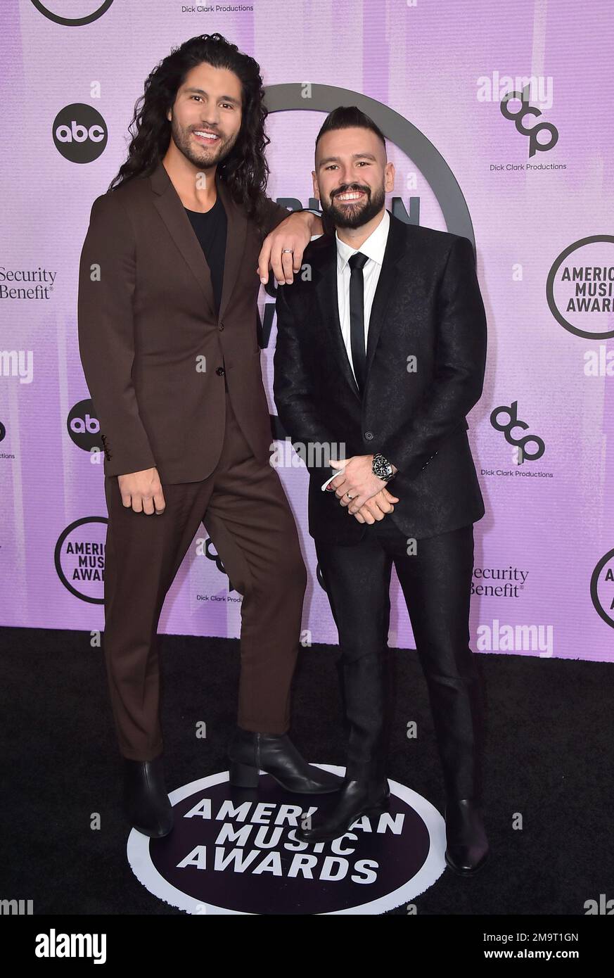Dan Smyers, left, and Shay Mooney of Dan + Shay arrive at the American ...