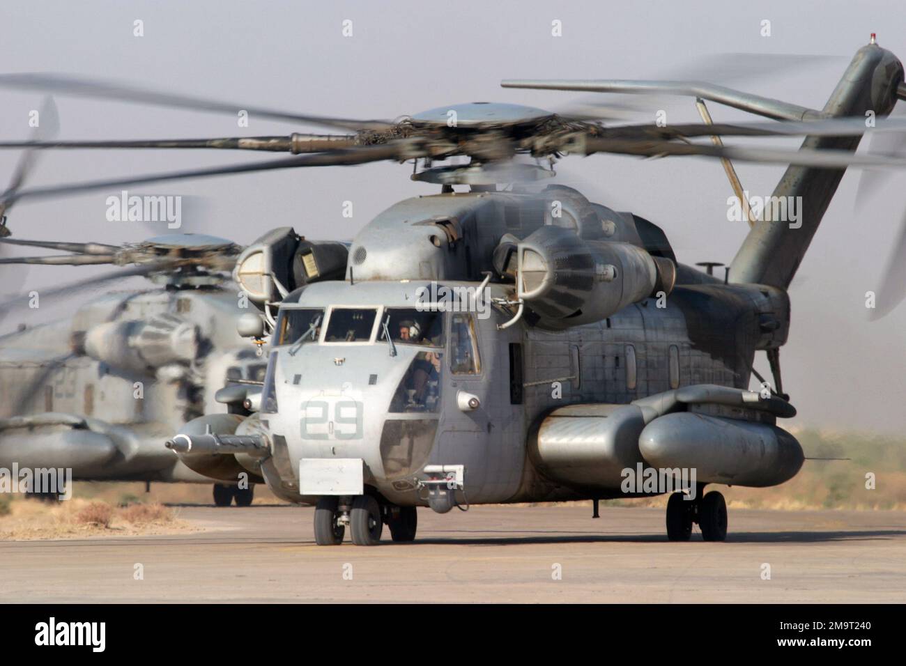 Two US Marine Corps (USMC) CH-53E Super Stallion helicopters assigned ...