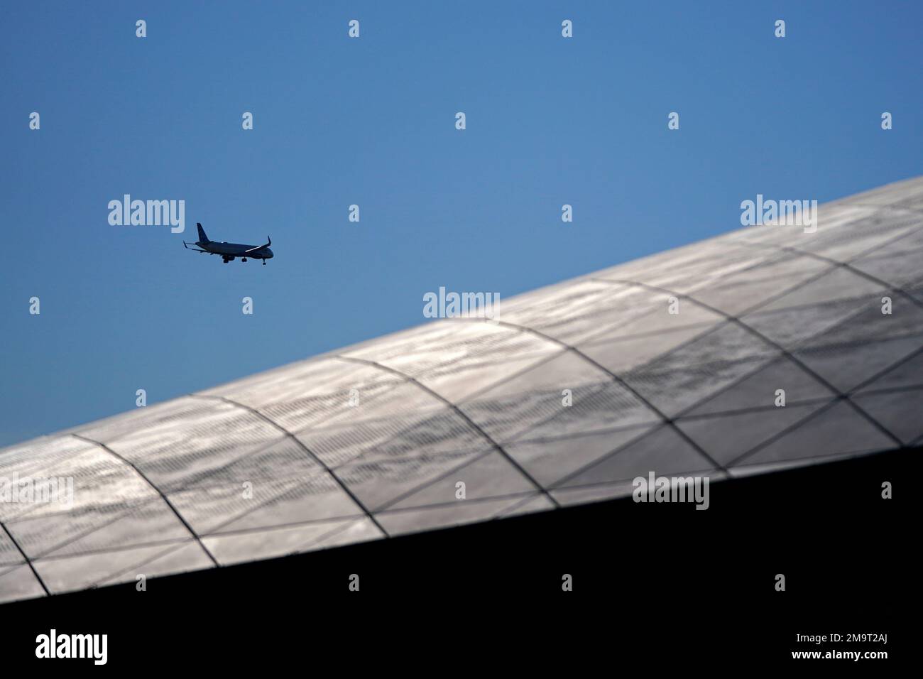 An aircraft is seen as it flies over SoFi Stadium prior to an NFL ...