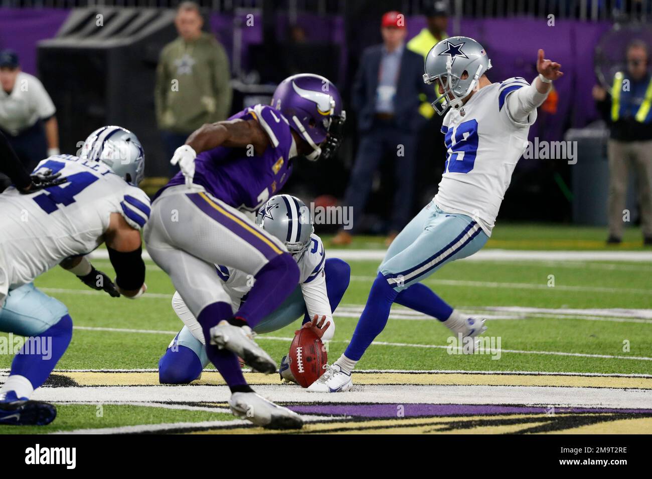 Dallas Cowboys place kicker Brett Maher, right, kicks a 60-yard field ...