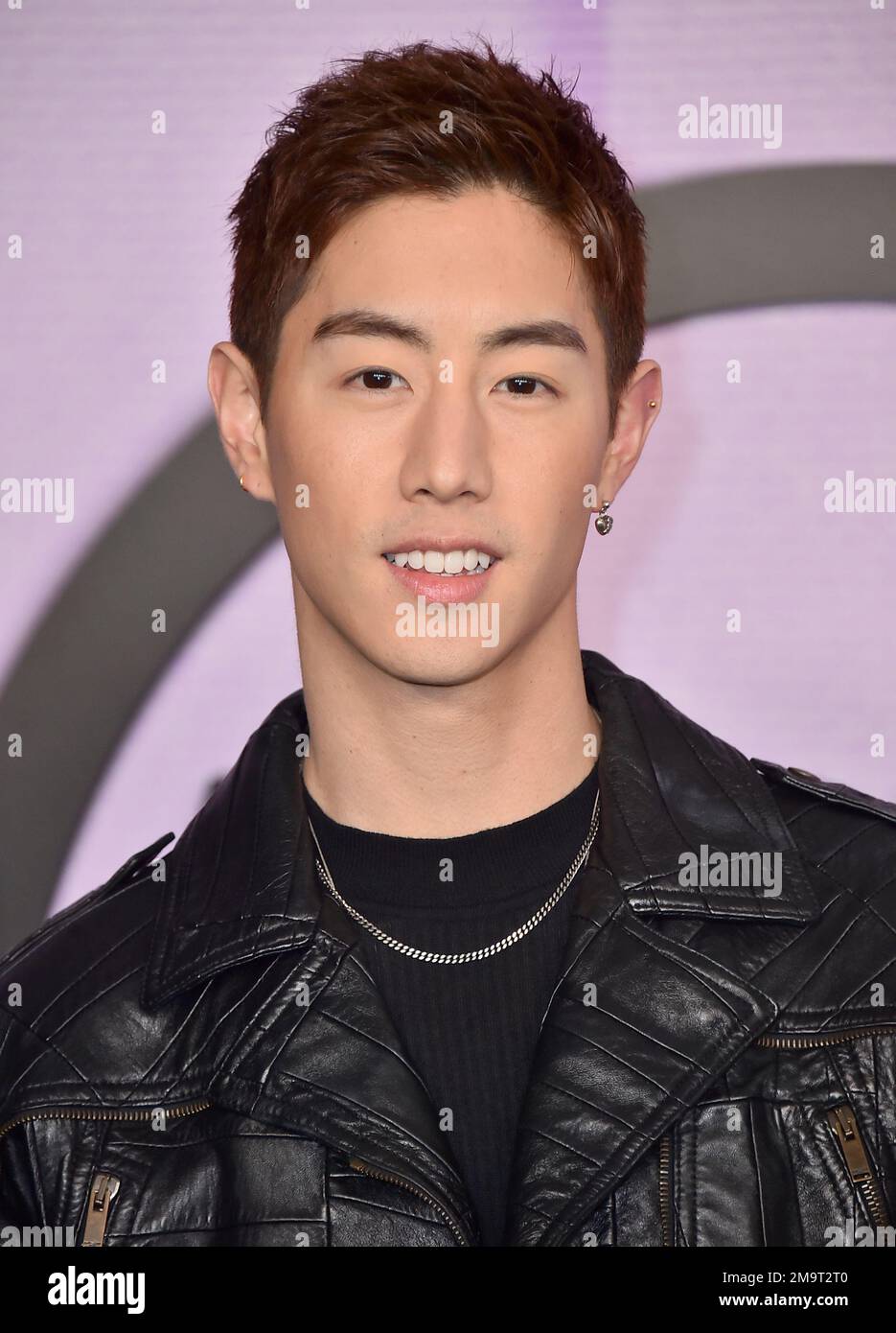 Mark Tuan arrives at the American Music Awards on Sunday, Nov. 20, 2022 ...