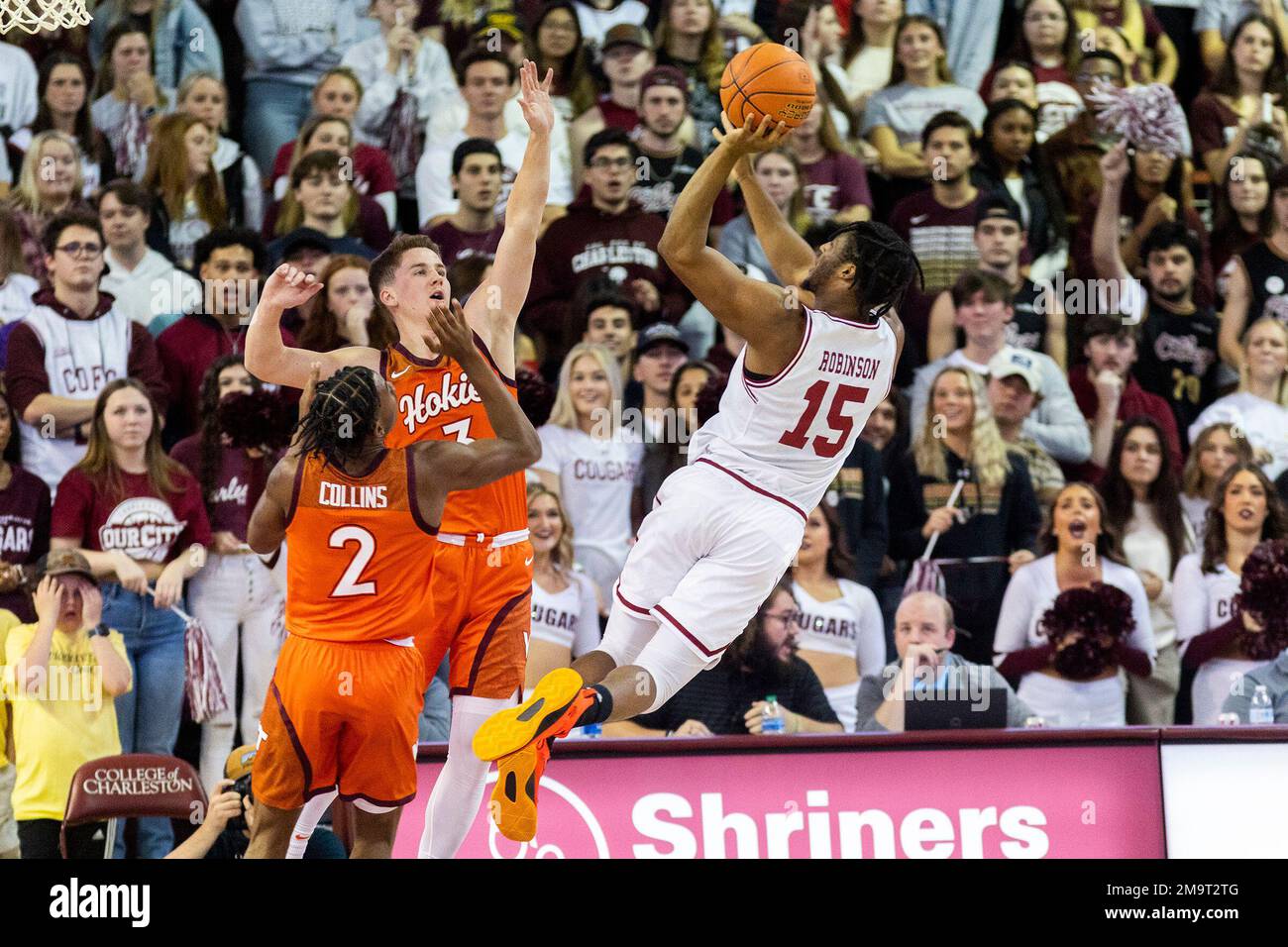 College of Charleston's Pat Robinson III (15) shoots against the ...