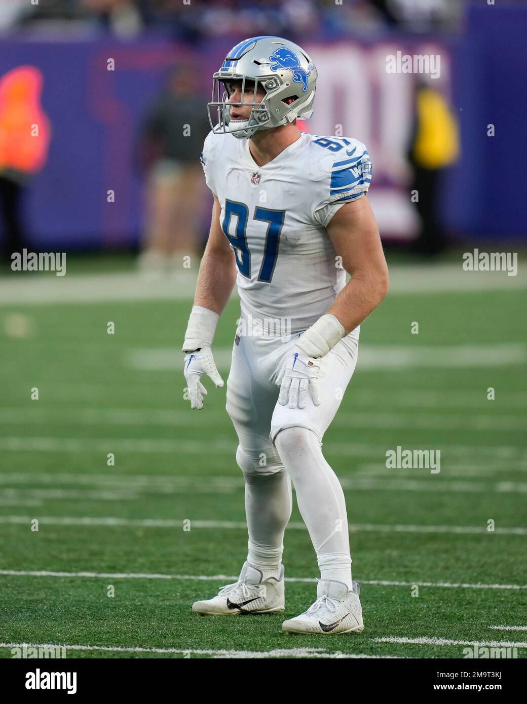 Detroit Lions defensive end Aidan Hutchinson (97) sets up for a play ...