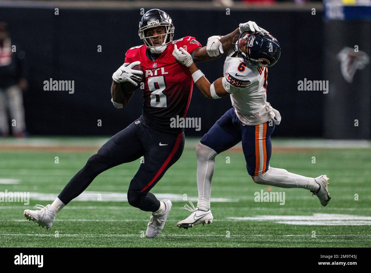 Atlanta Falcons tight end Kyle Pitts (8) stiff arms Chicago Bears ...