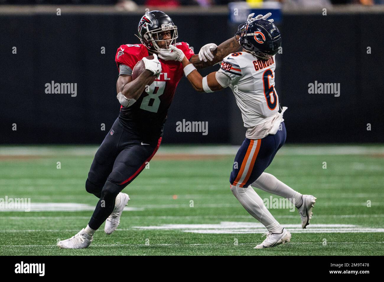 Atlanta Falcons tight end Kyle Pitts (8) stiff arms Chicago Bears ...