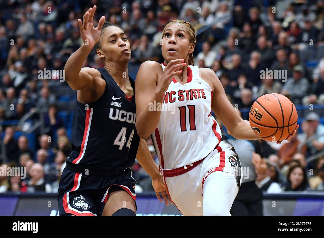 North Carolina State's Jakia Brown-Turner (11) drives to the basket as ...