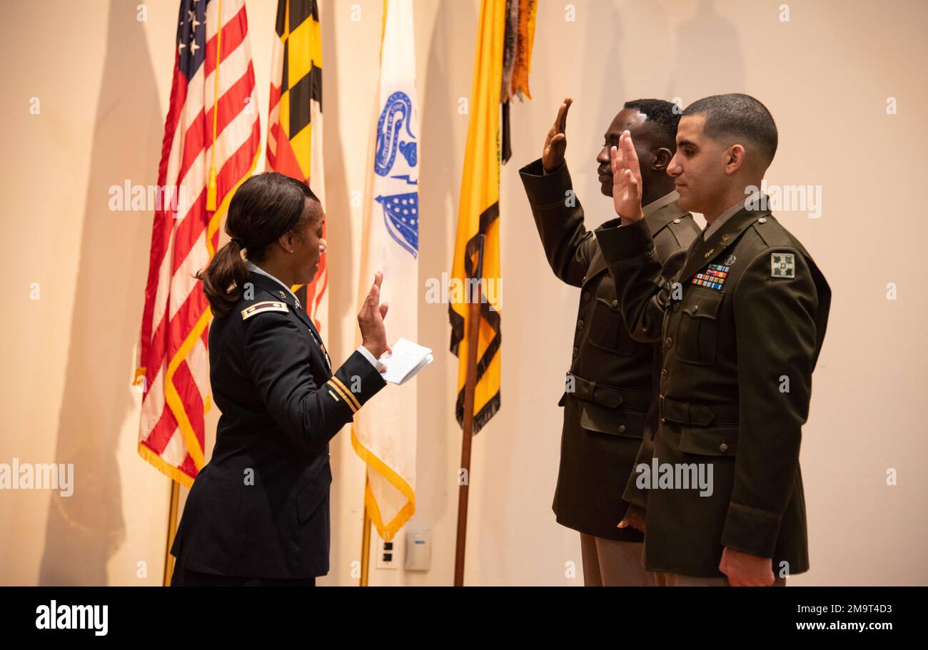 Maj. Melisa Natapraya administers the oath of office to new 2nd Lts ...
