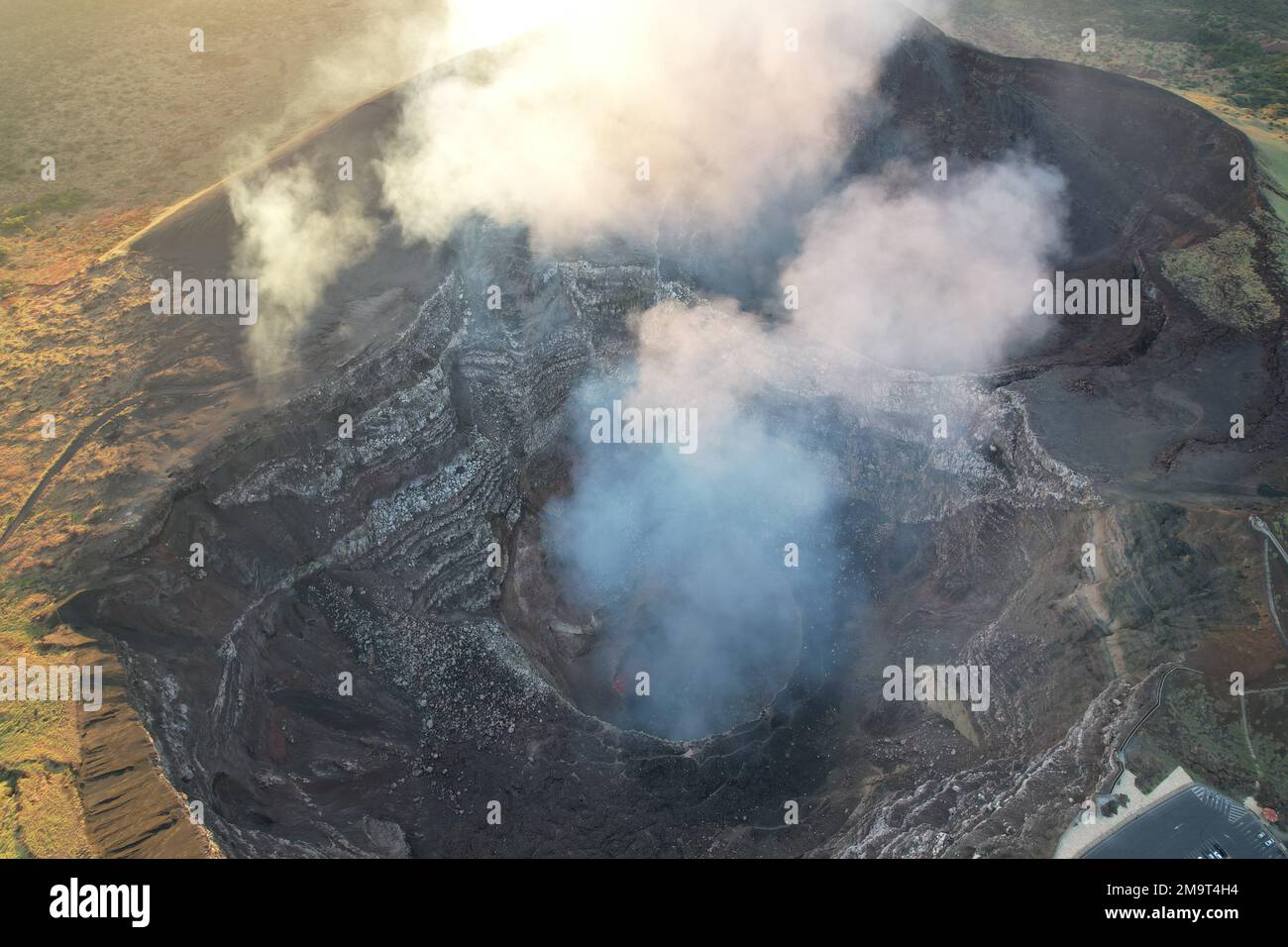 Top aerial view of volcanic eruption hi-res stock photography and ...