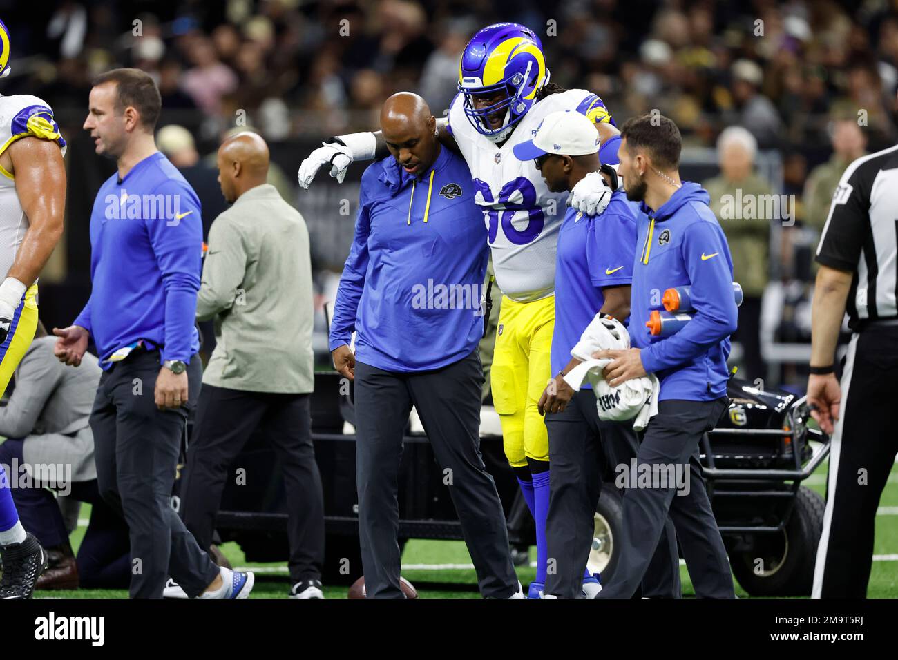 Los Angeles Rams offensive tackle Ty Nsekhe (68) is helped off the ...