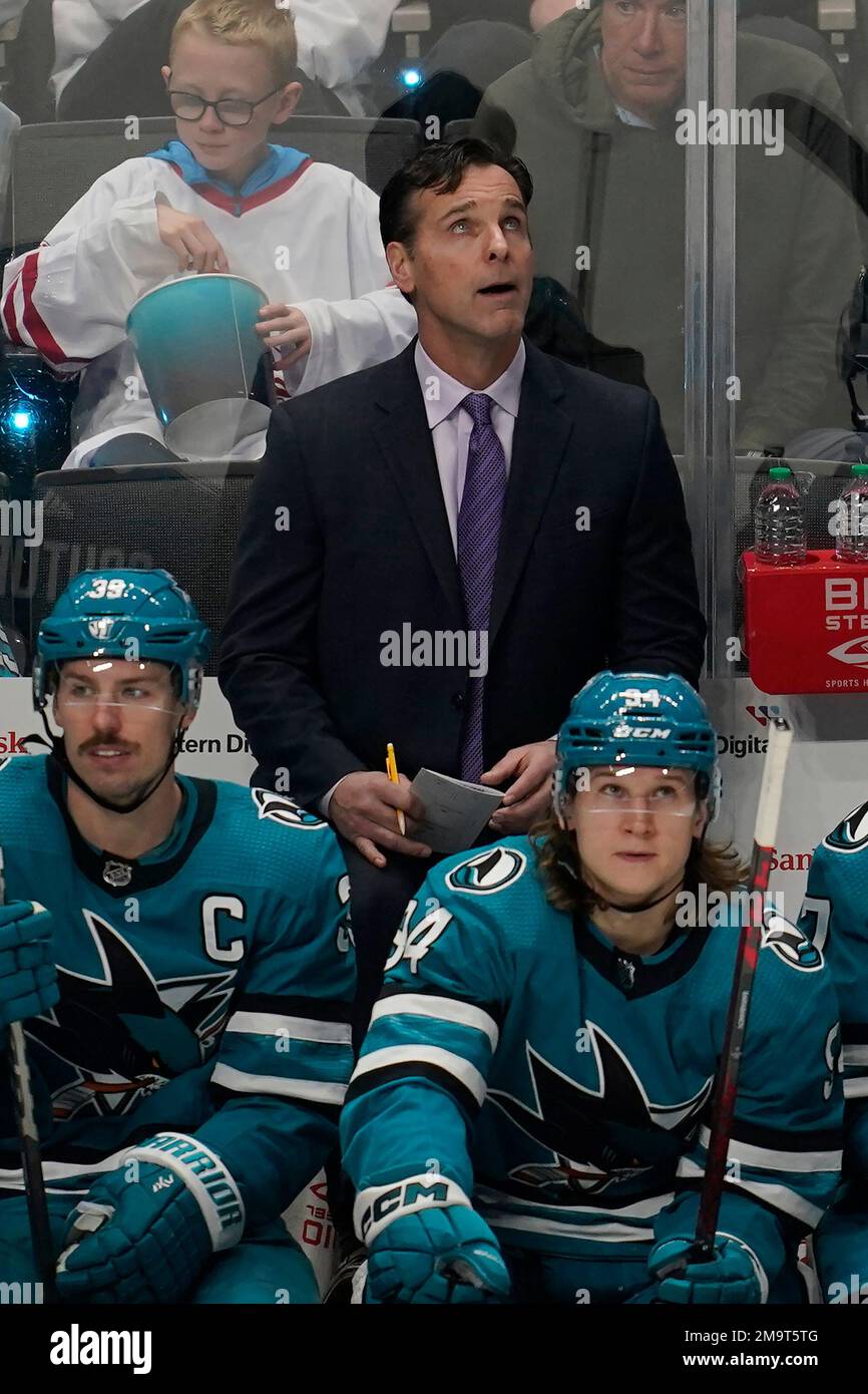 San Jose Sharks head coach David Quinn, top, watches during an NHL ...