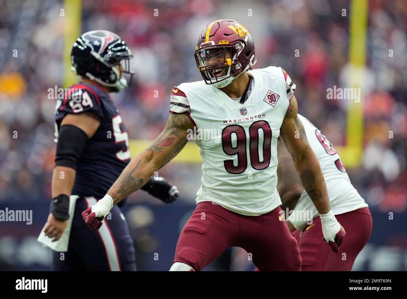 Washington Commanders defensive end Montez Sweat (90) celebrates after ...