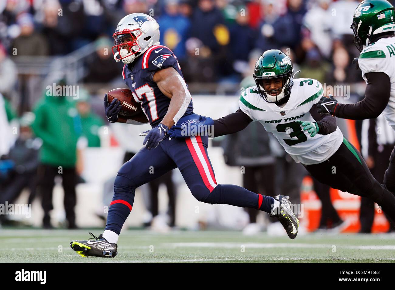 New England Patriots running back Damien Harris (37) tries to outrun ...