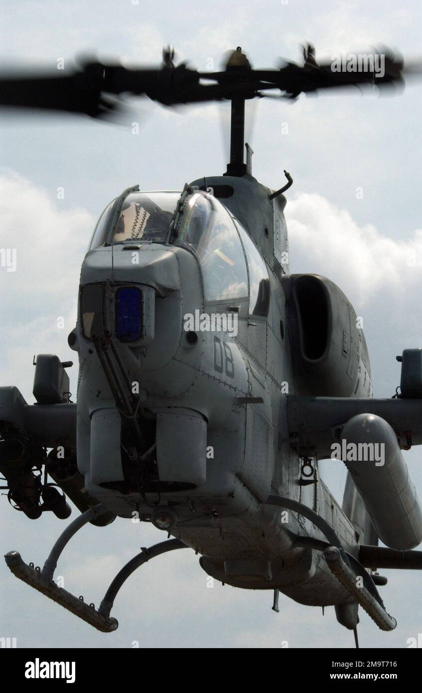 A US Marine Corps (USMC) AH-1W Super Cobra from Helicopter Marine Light ...