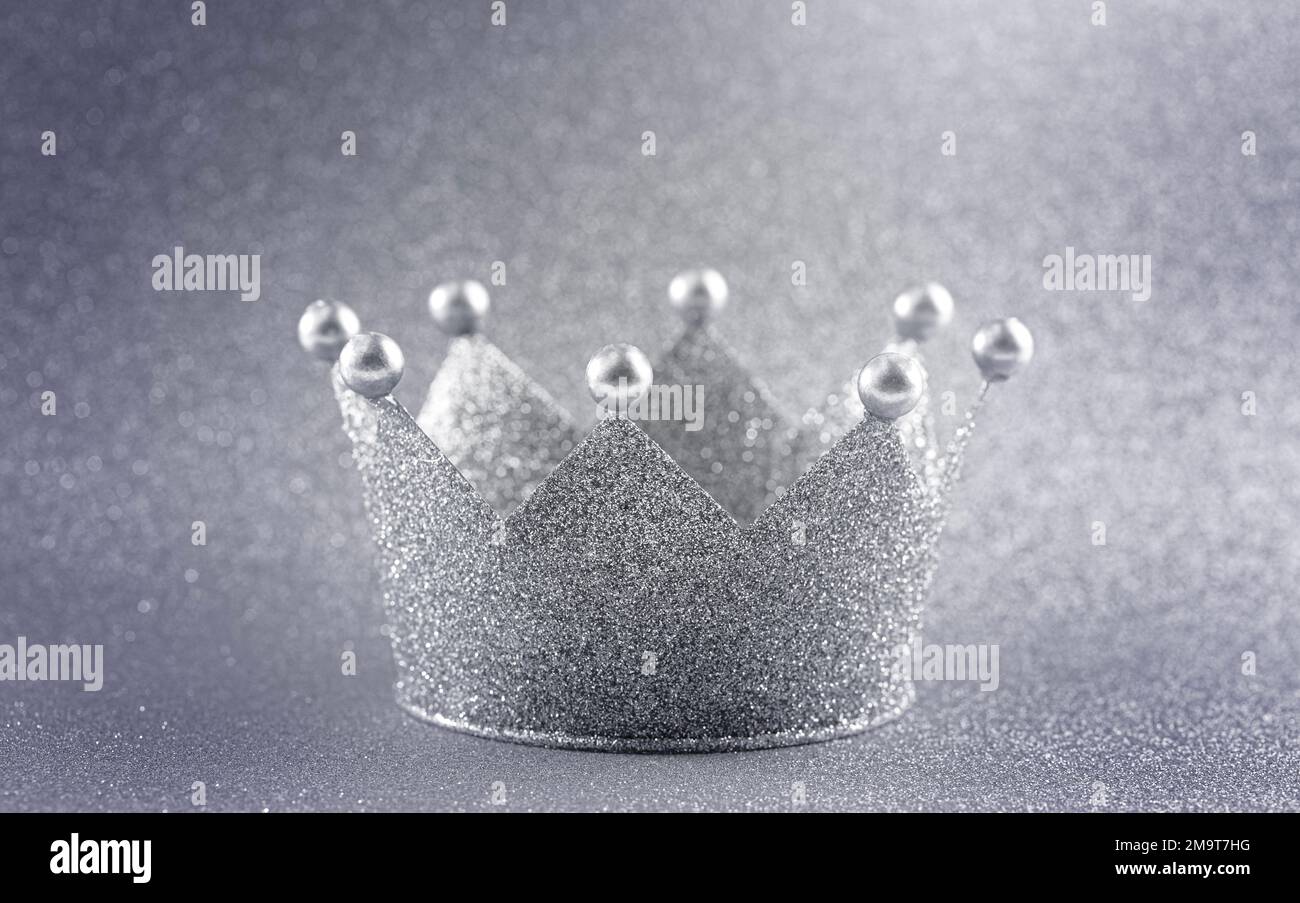 Classic Silver Crown on a Glittery Silver Background Stock Photo - Alamy