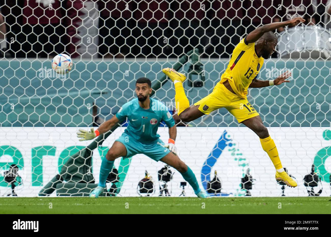Ecuador's Enner Valencia, right, scores his second goal against Qatar's ...