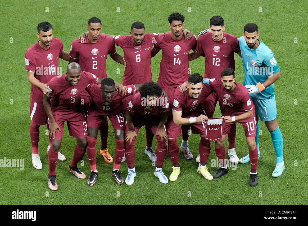 Qatar's team players pose for a picture prior to the World Cup group A ...
