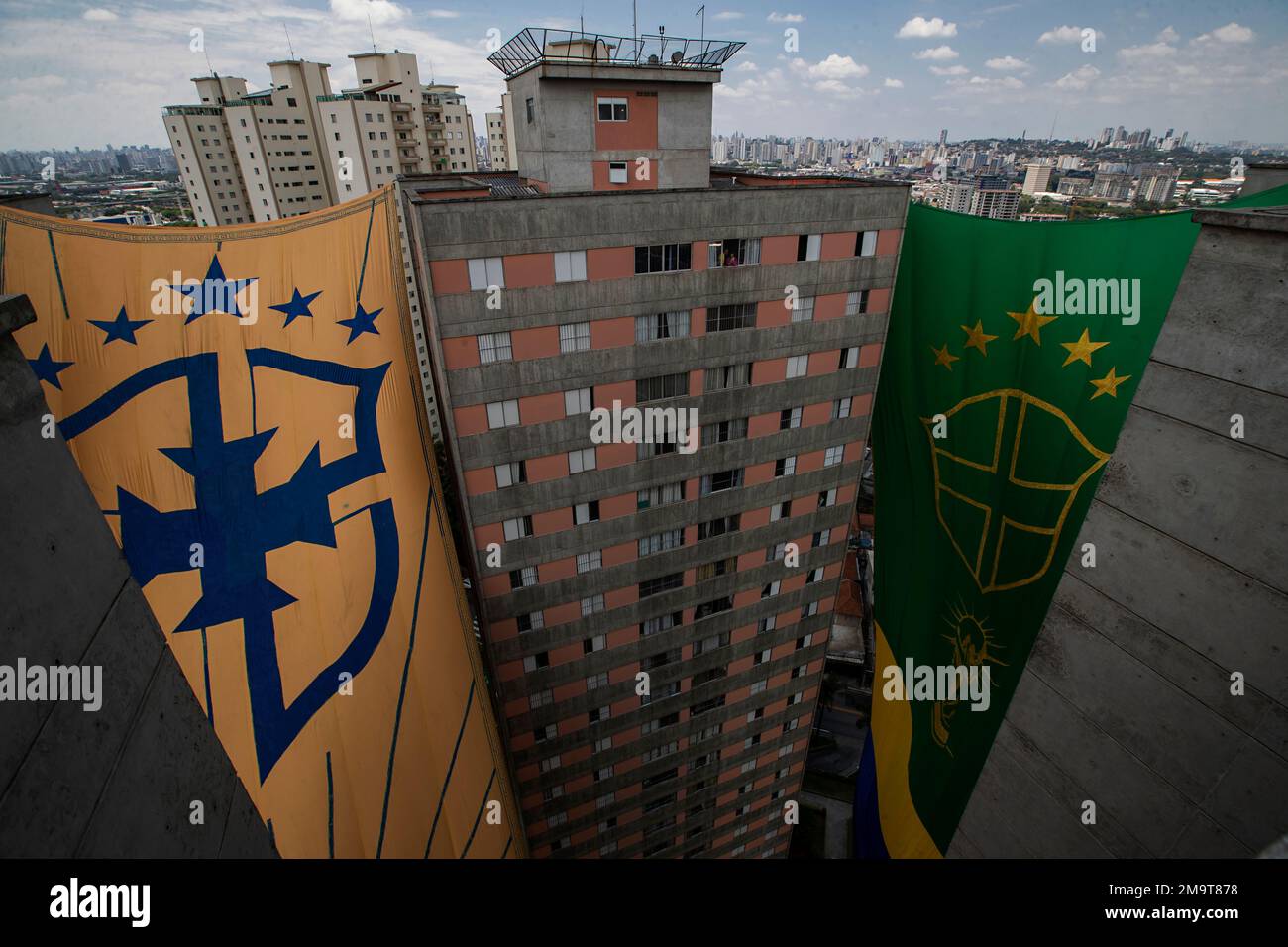 Two large 70 meter high Brazilian soccer team flags are hoisted between ...