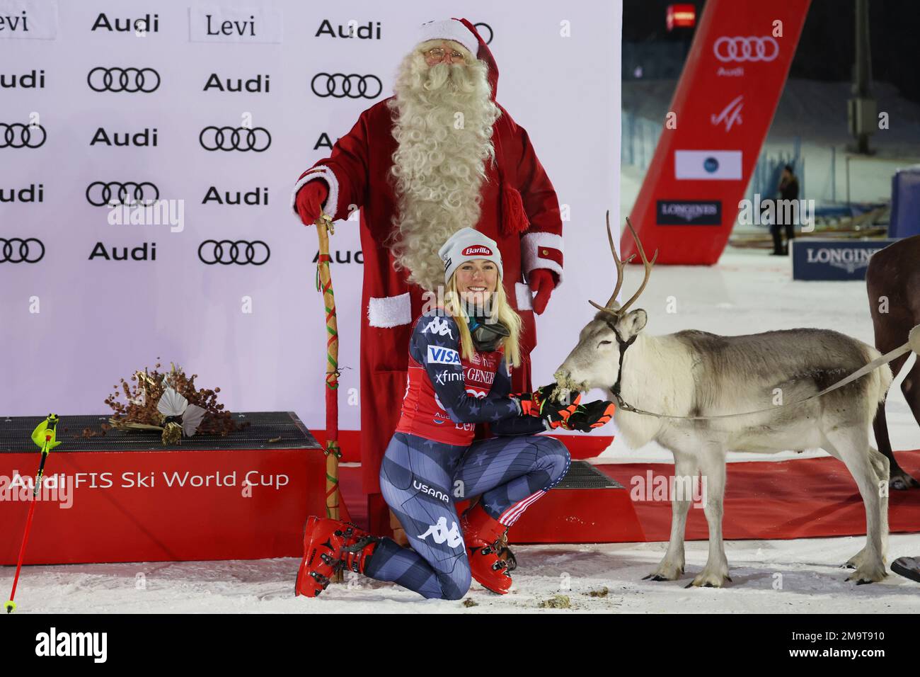 United States' Mikaela Shiffrin poses with Santa Claus and a reindeer ...