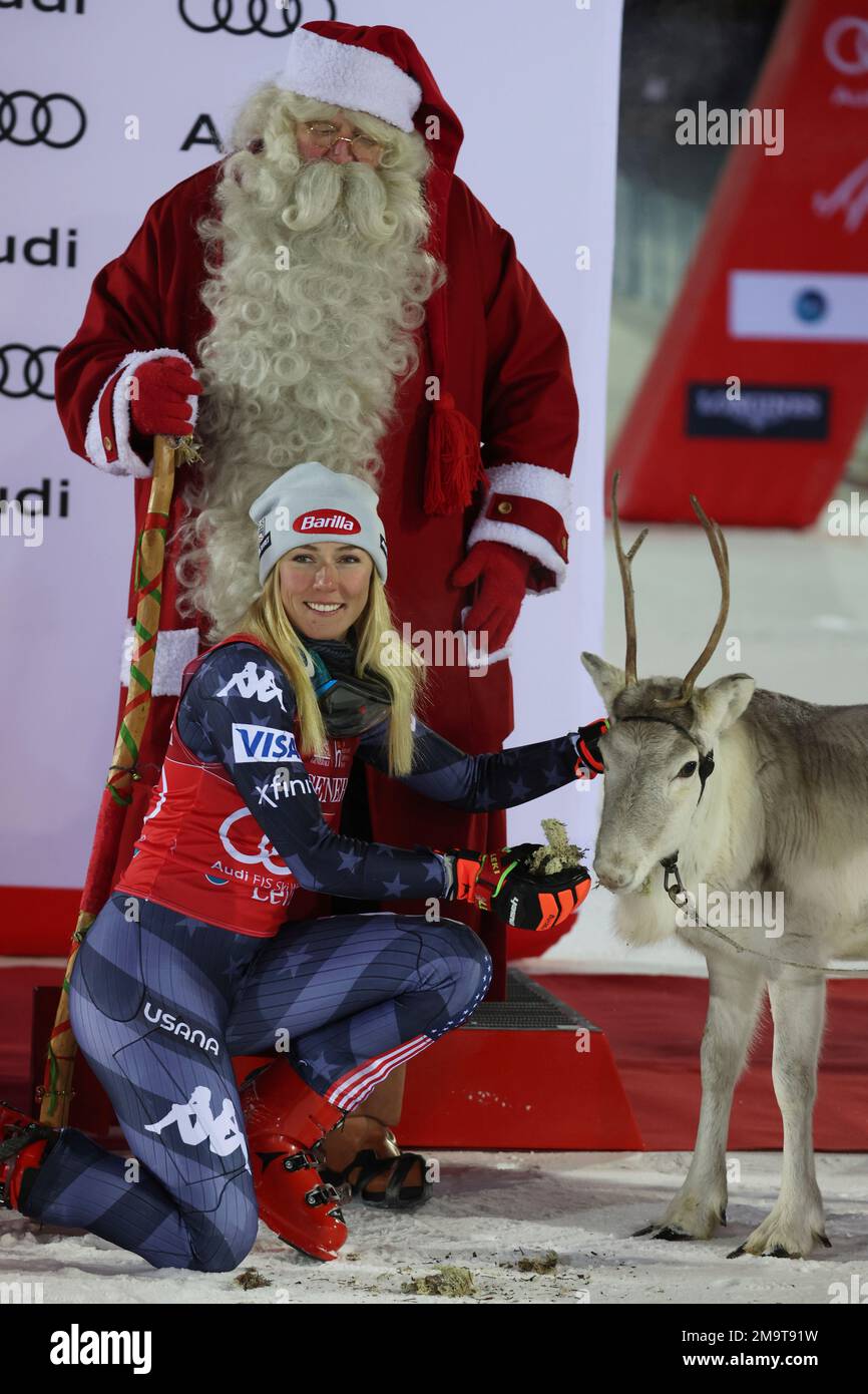 United States' Mikaela Shiffrin poses with Santa Claus and a reindeer ...