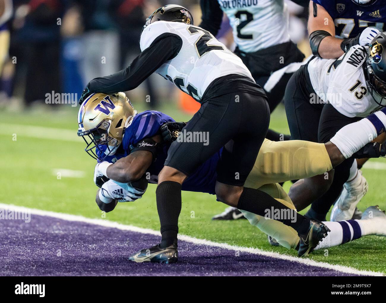 Washington running back Jay'Veon Sunday scores a touchdown against ...