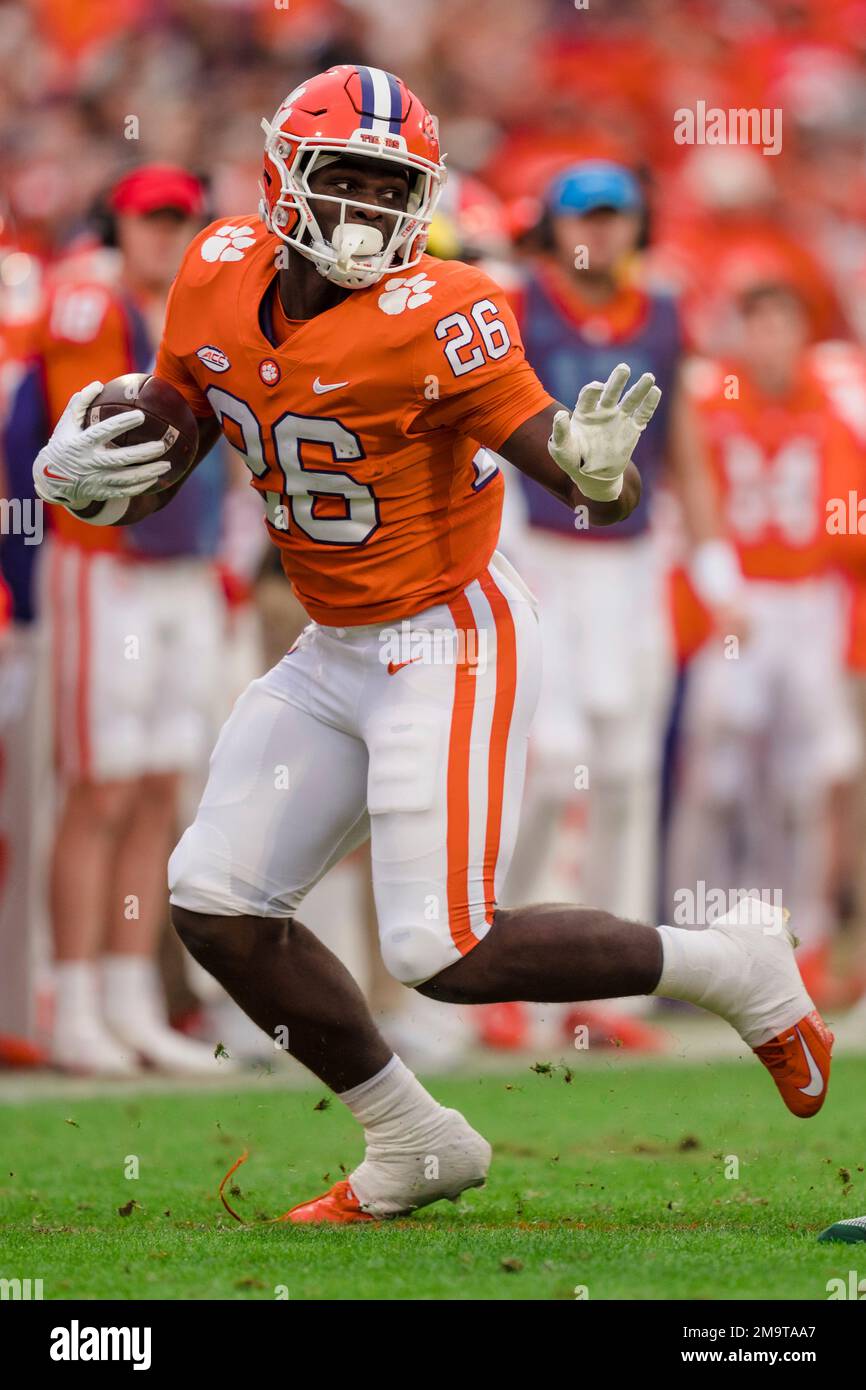 Clemson running back Phil Mafah (26) runs with the ball against Miami ...