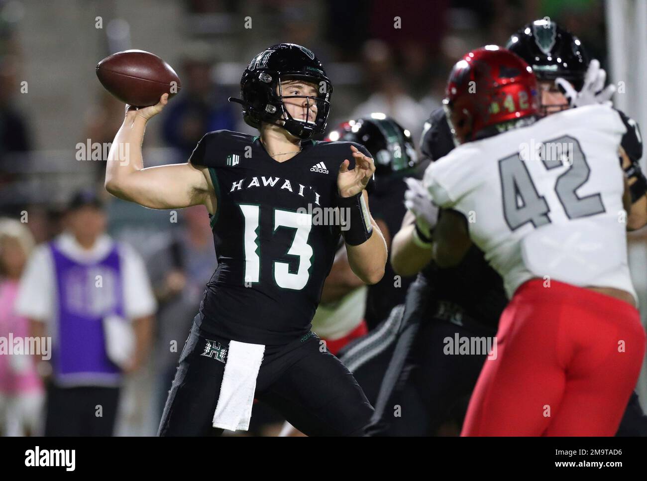 Hawaii quarterback Brayden Schager (13) throws a pass against UNLV ...
