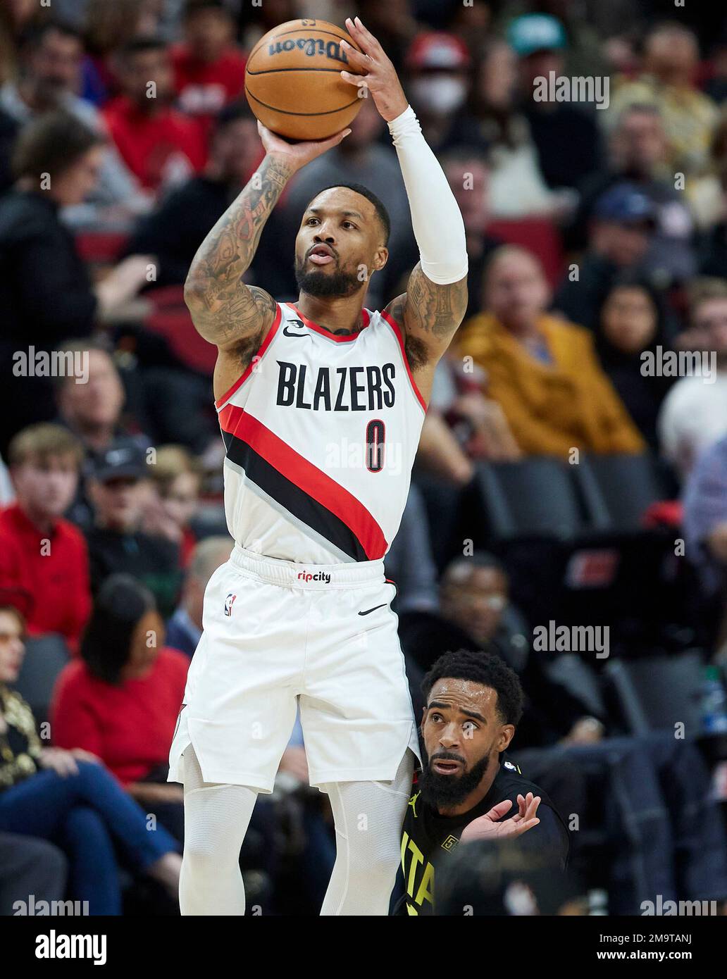 Portland Trail Blazers guard Damian Lillard is fouled by Utah Jazz ...