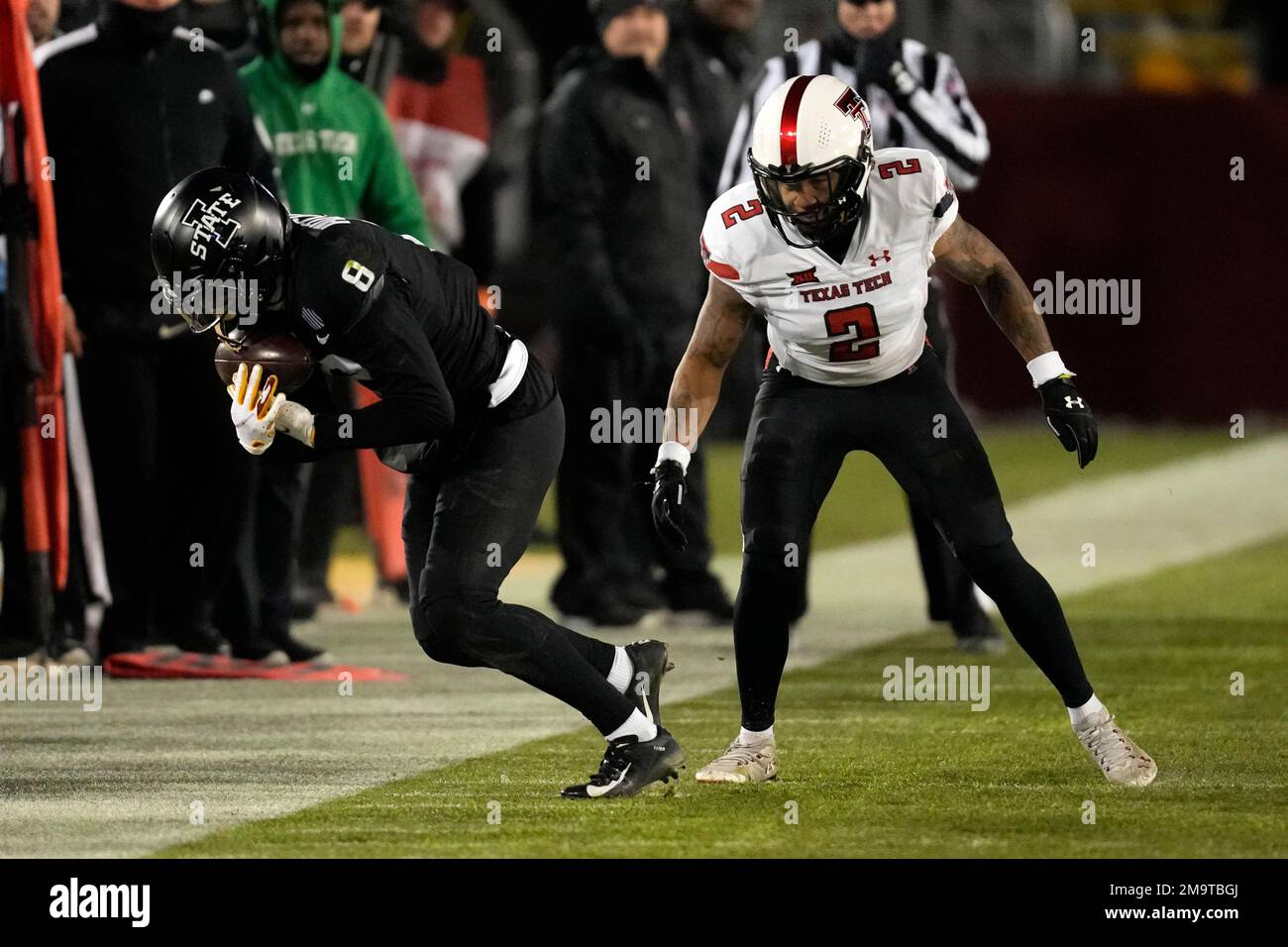 Iowa State wide receiver Xavier Hutchinson (8) catches a pass ahead of ...