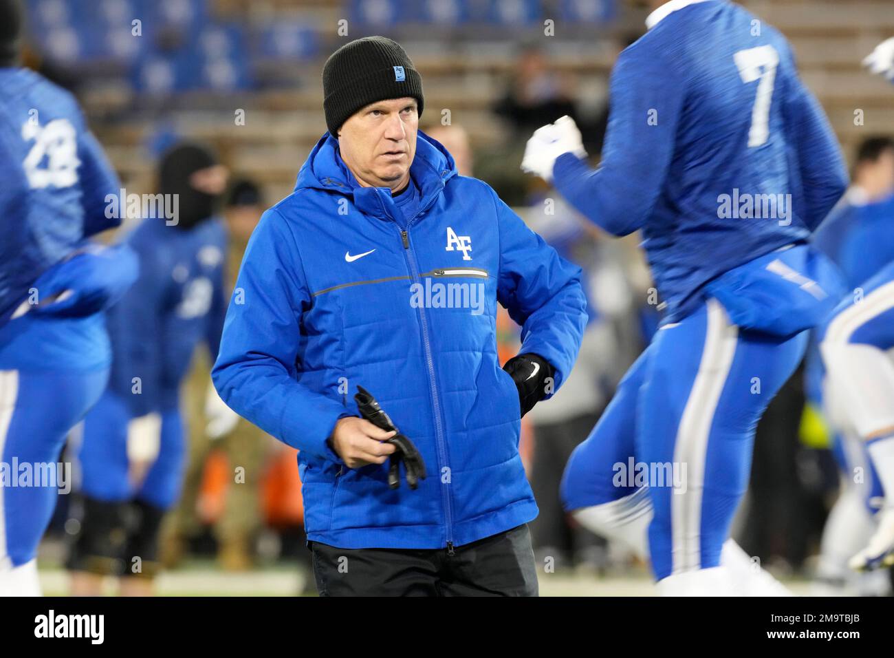 Air Force head coach Troy Calhoun looks on as players warm up before an ...