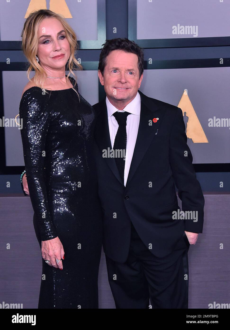 Tracy Pollan, left, and Michael J. Fox arrive at the Governors Awards ...