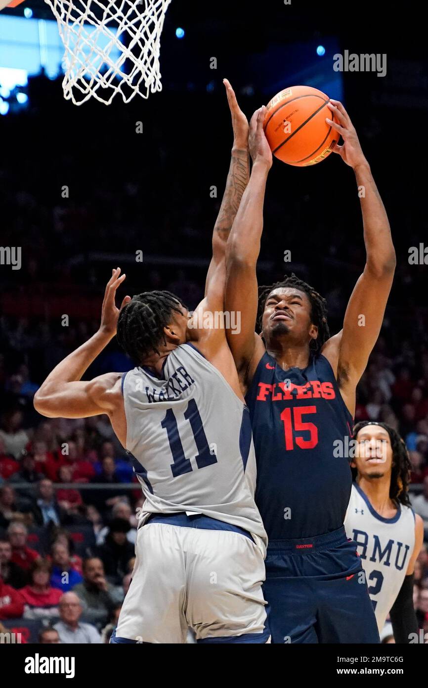 Dayton forward DaRon Holmes II (15) attempts a shot as Robert Morris ...