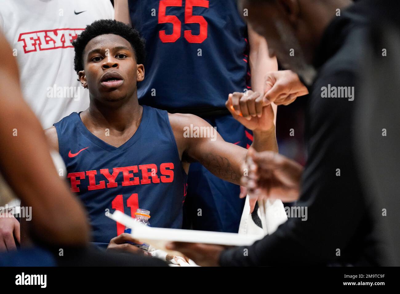 Dayton guard Malachi Smith (11) listens during a timeout in the second ...
