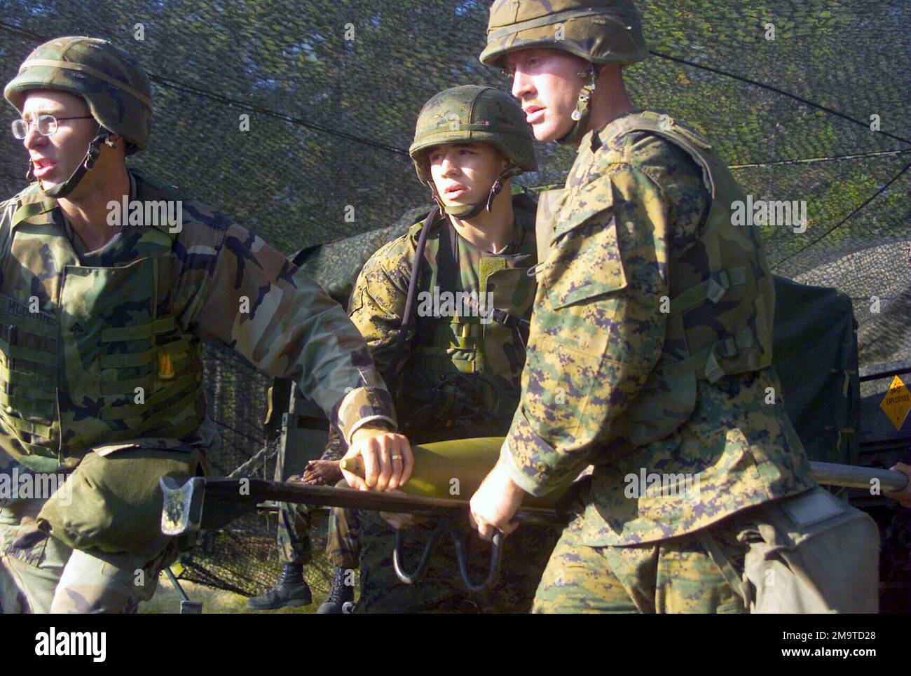 031015-M-9382M-014. US Marine Corps (USMC) Corporal (CPL) McBride, left ...