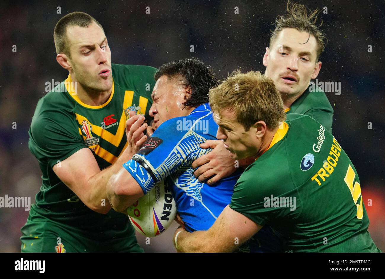 Samoa's Josh Papalii, centre, fights for the ball during the Rugby ...