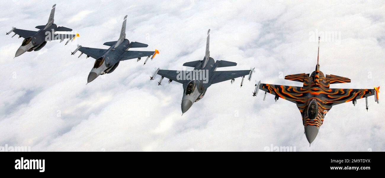 030917-F-0381R-004. [Complete] Scene Caption: Four US Air Force (USAF ...