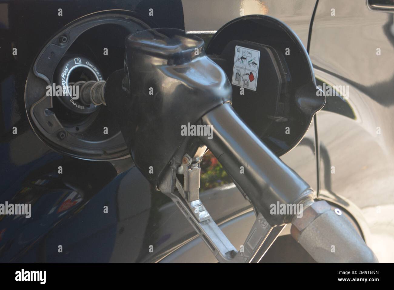 Putting gas in car hi-res stock photography and images - Alamy