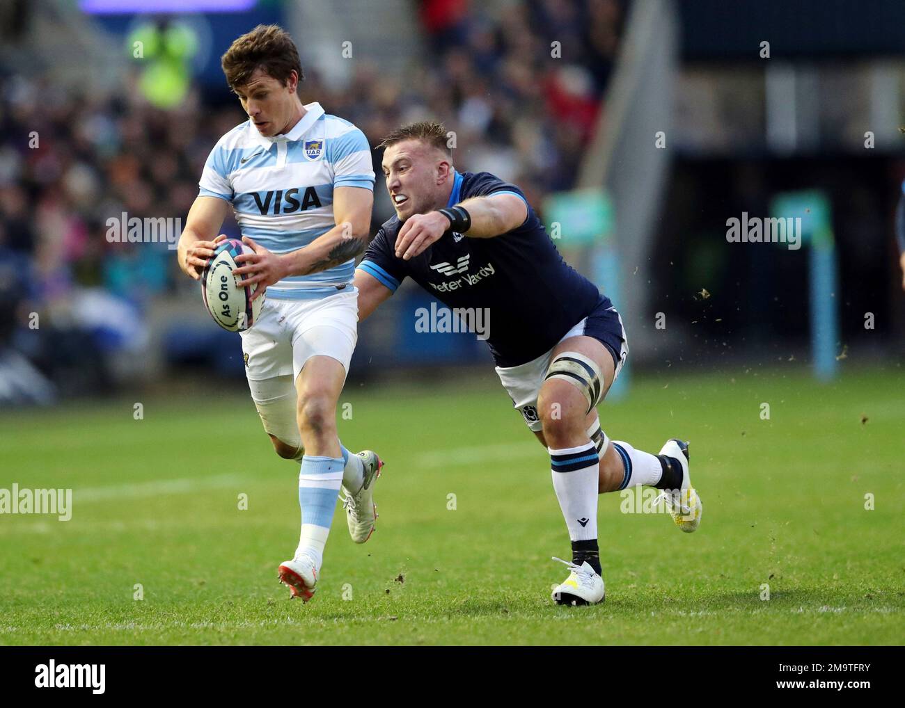 Argentina's Gonzalo Bertranou, left, is tackled by Scotland's Matt ...
