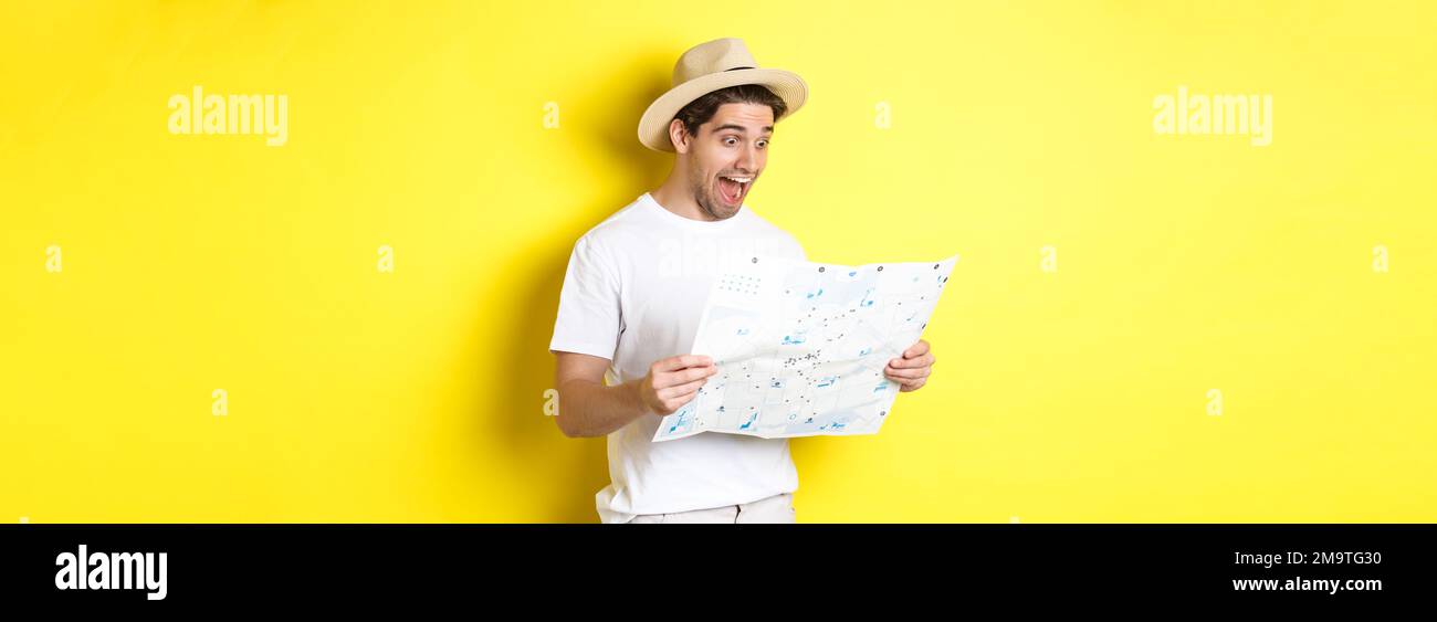 Travelling, vacation and tourism concept. Smiling happy tourist looking ...