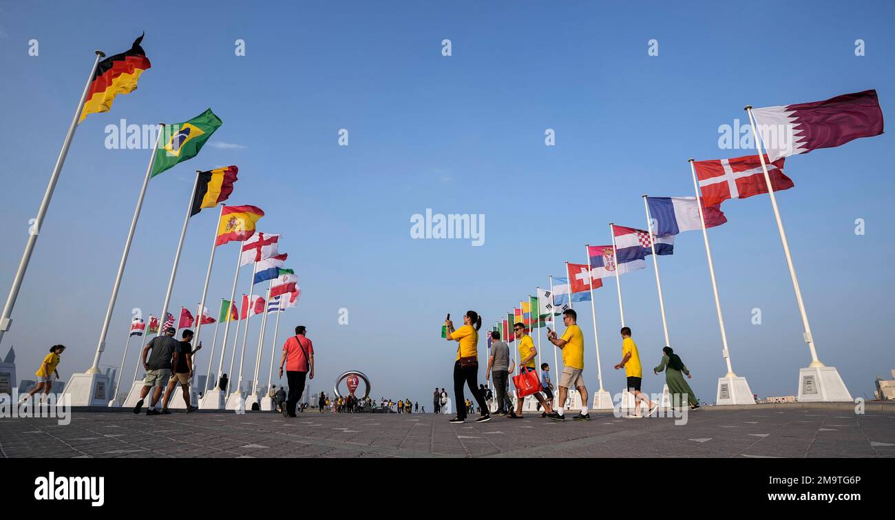 Flags of the competing countries wave in the wind at the Doha Corniche ...