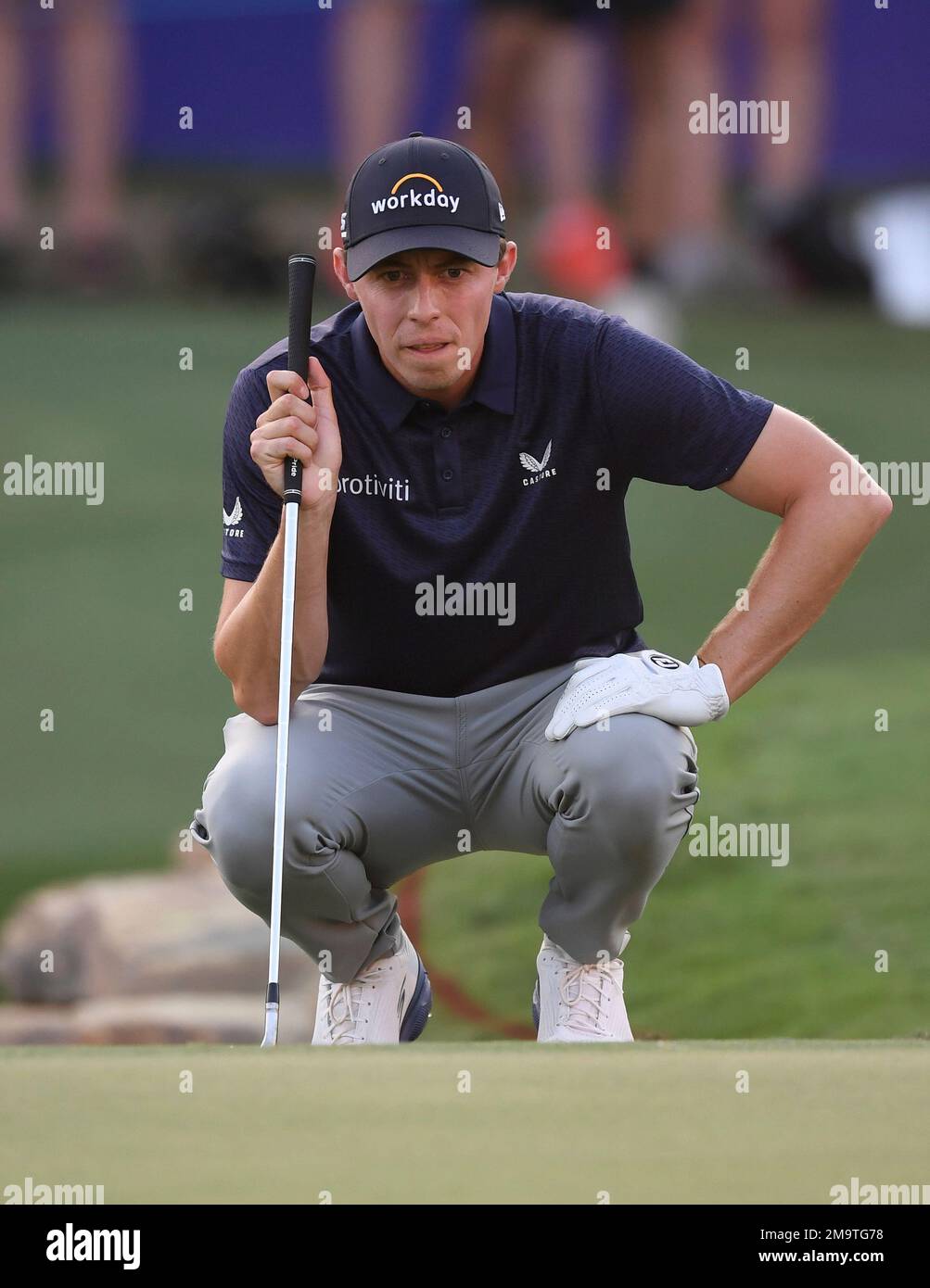 Matt Fitzpatrick of England checks the 18th green during DP World Tour ...