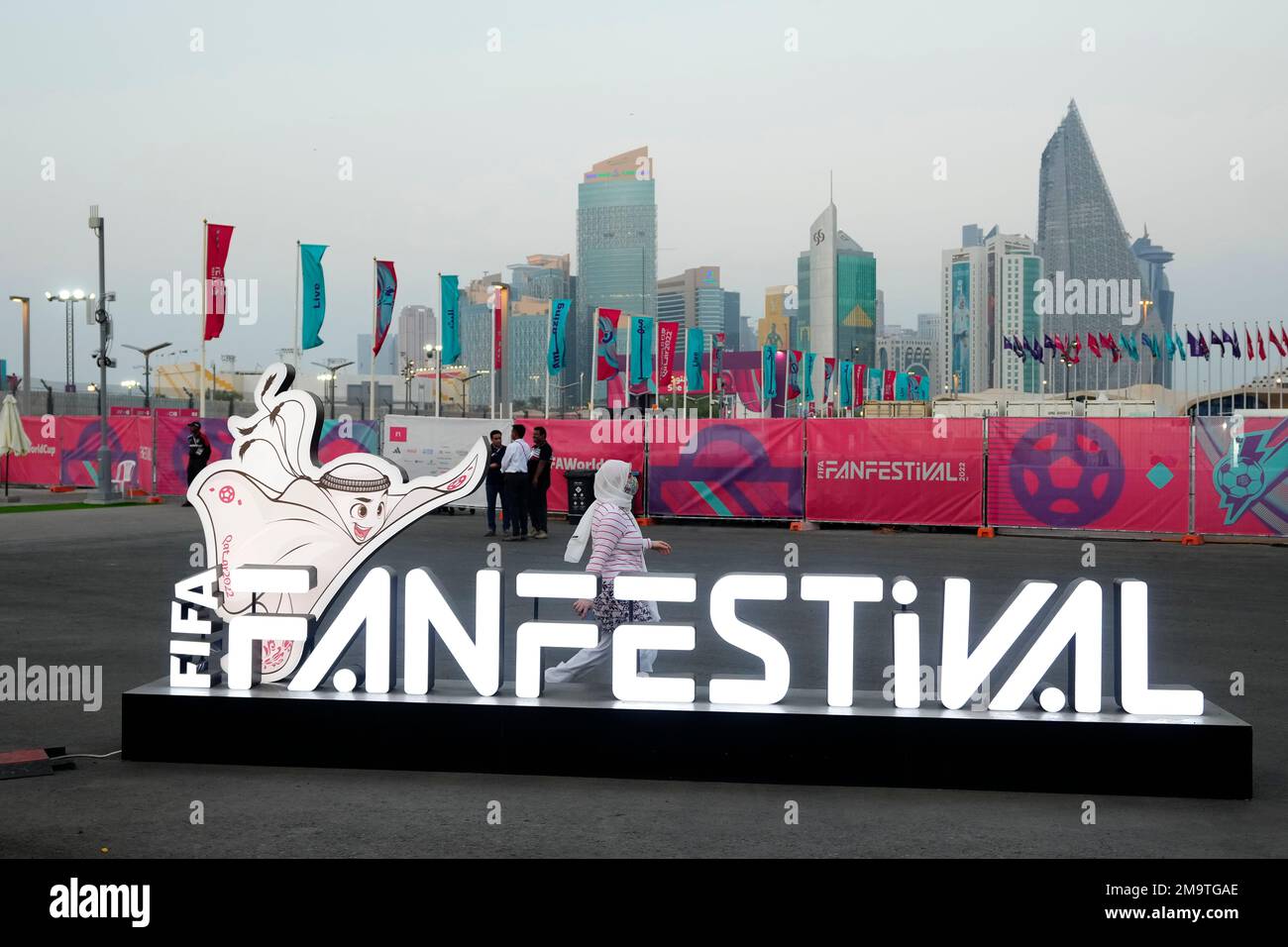 Fans arrive as the fan zone opens ahead of the FIFA World Cup in Doha ...