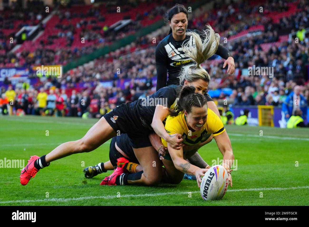 Australia's Jessica Sergis scores her side's third try during the Women ...