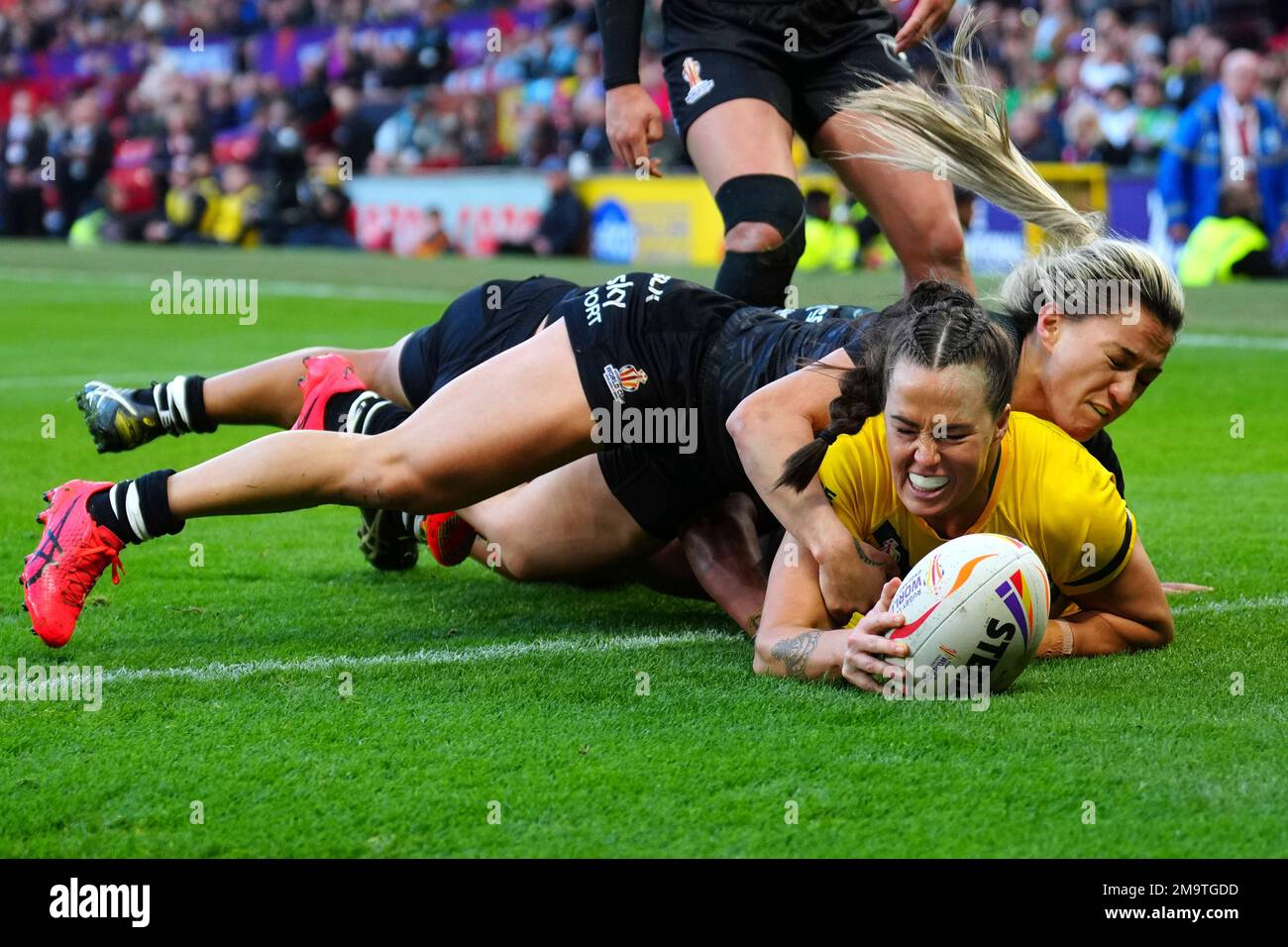 Australia's Jessica Sergis scores her side's third try during the Women ...