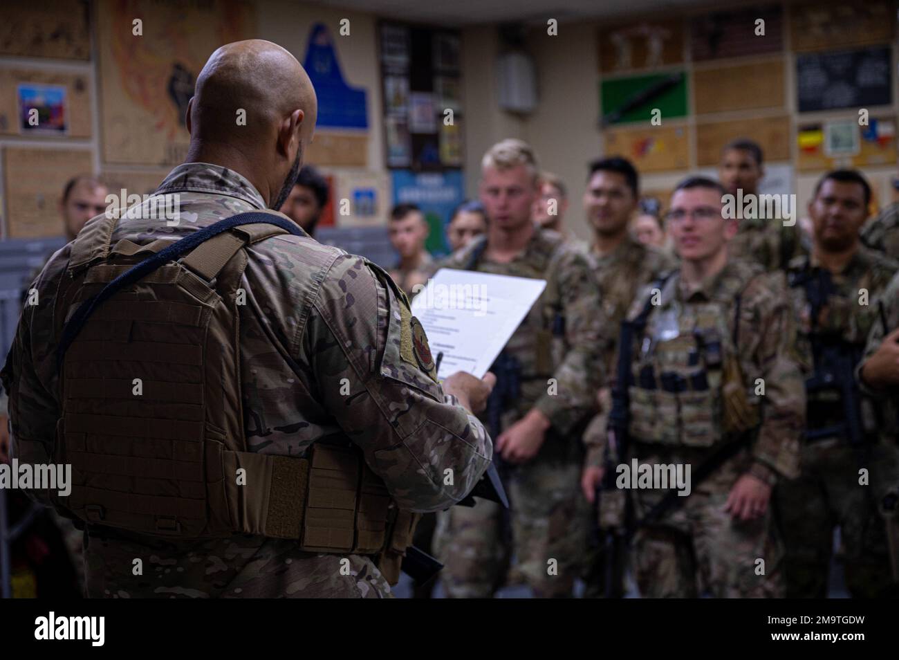 U.S. Airmen are briefed during their morning guard mount at Ali Al ...